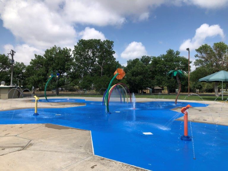 Inclusive Playground Island Grove Park in Greeley | Slides and Sunshine
